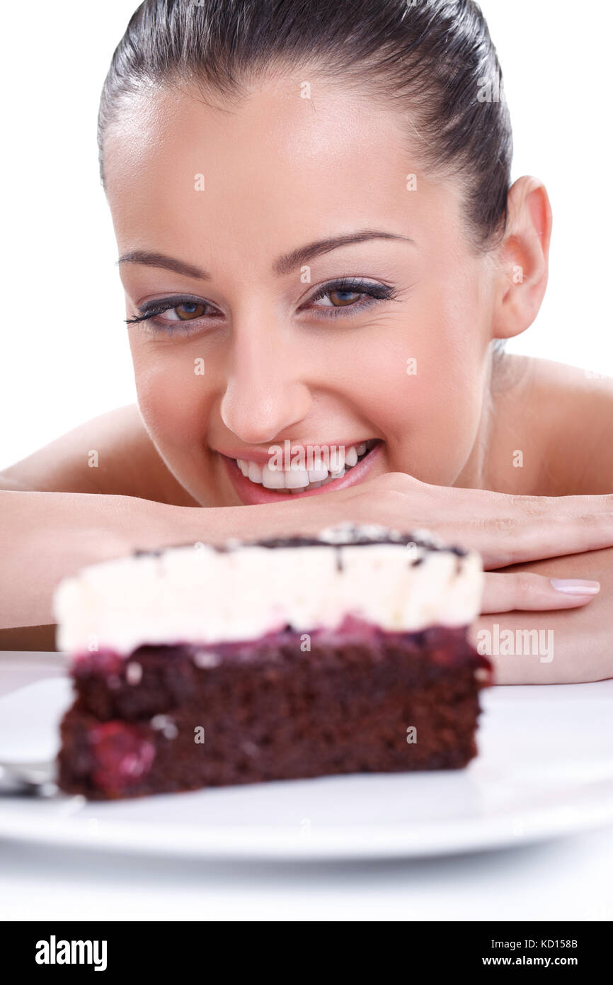 Happy beautiful woman looking in piece of tasty cakes Stock Photo - Alamy