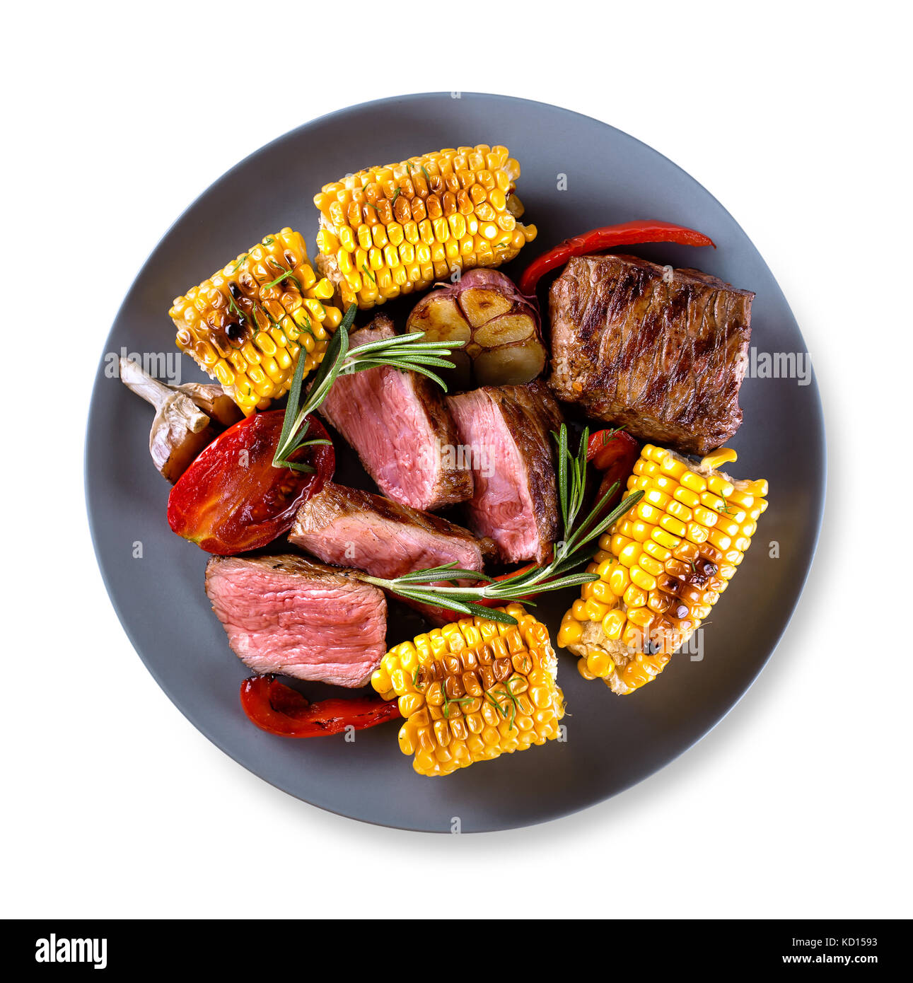 Round blue plate with pieces of chopped steak Stock Photo - Alamy