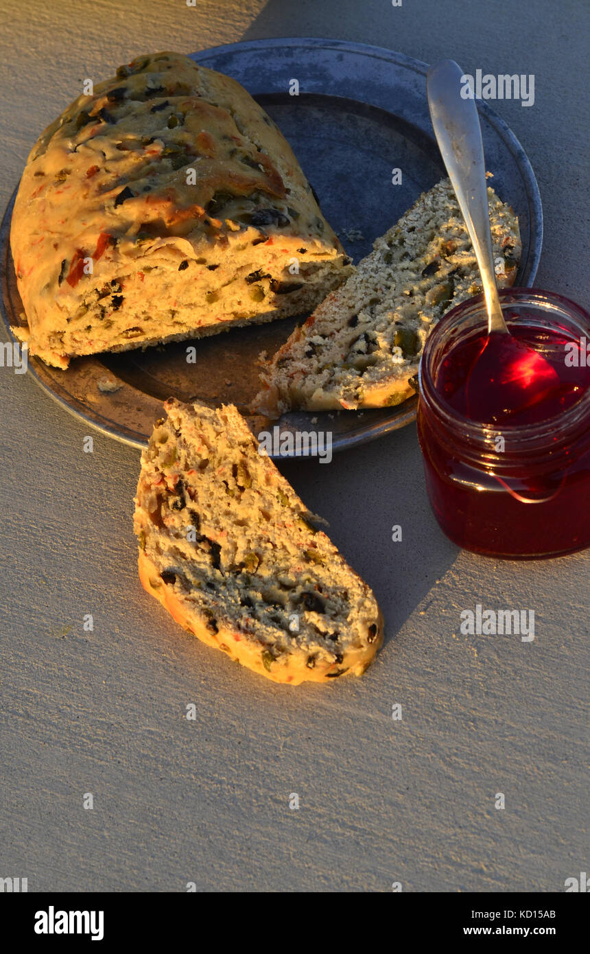 Artisanal olive bread loaf and cactus fruit jelly Stock Photo - Alamy