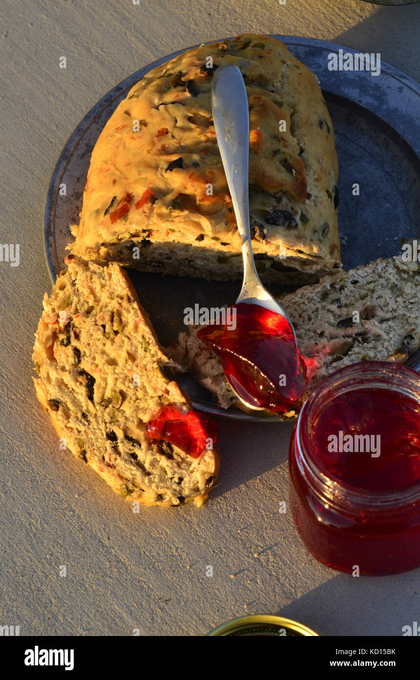 Artisanal olive bread loaf and cactus fruit jelly Stock Photo - Alamy