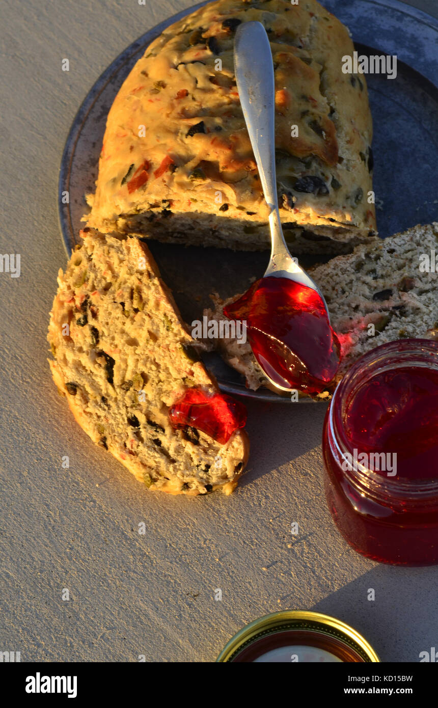 Artisanal olive bread loaf and cactus fruit jelly Stock Photo - Alamy