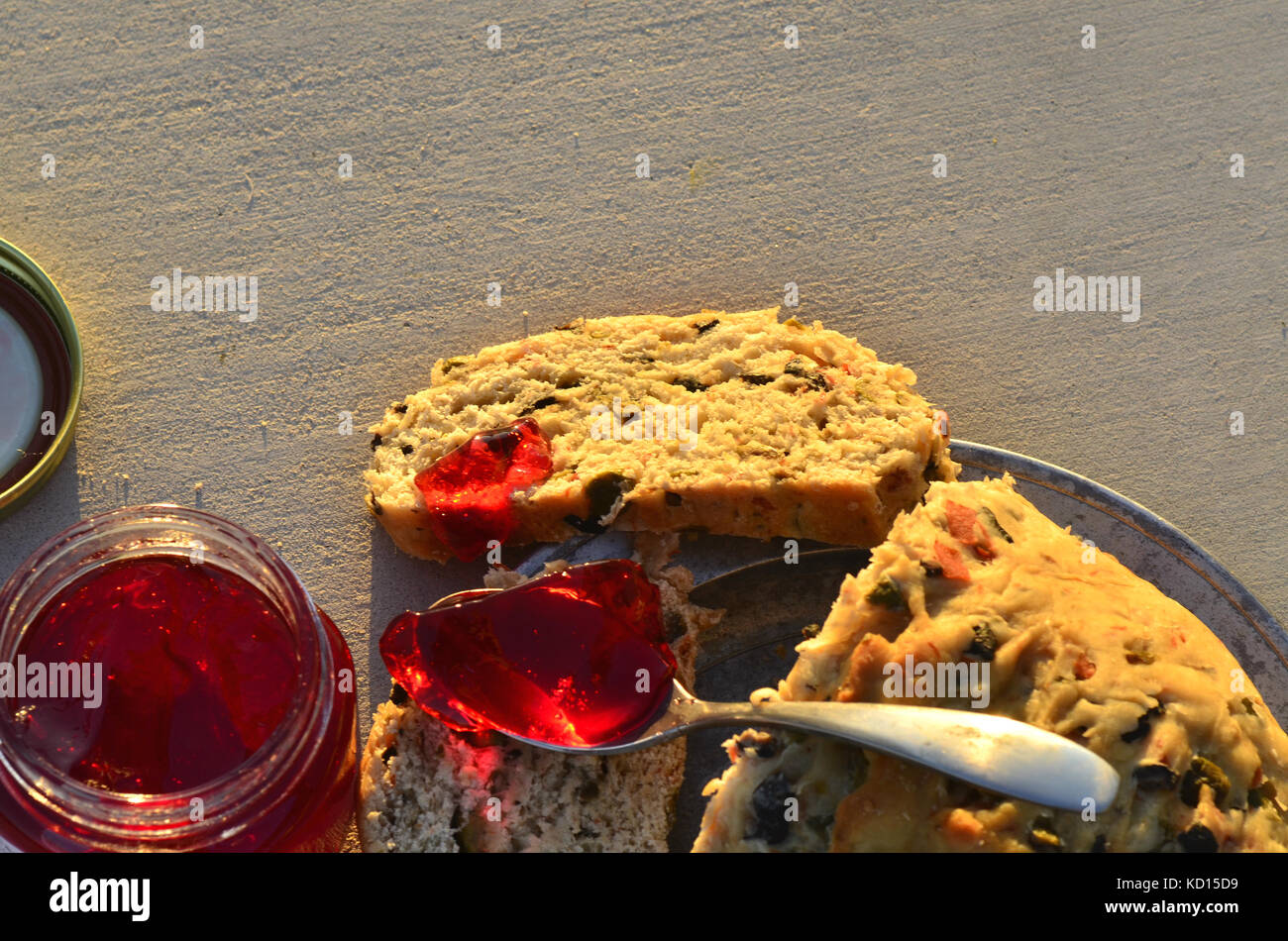 Artisanal olive bread loaf and cactus fruit jelly Stock Photo - Alamy