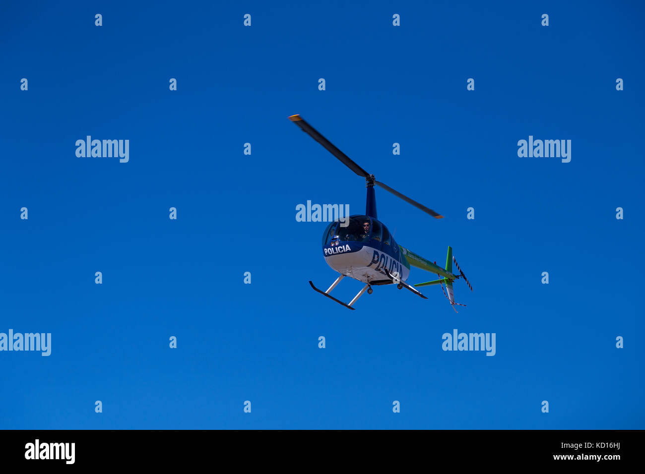 Policeman in helicopter hi-res stock photography and images - Alamy