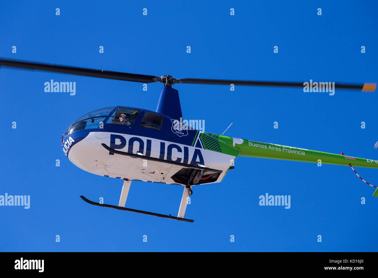Police helicopter flying over a beacj in Argentina Stock Photo - Alamy