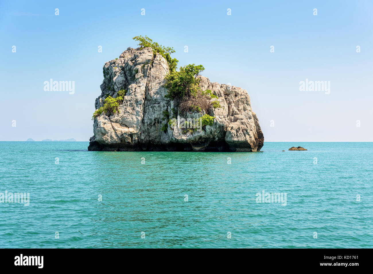 Beautiful natural landscape of small island on the sea under bright ...