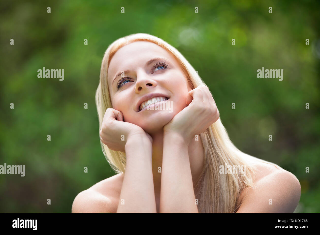 Portrait Of The Young Happy Thoughtful Woman Stock Photo - Alamy