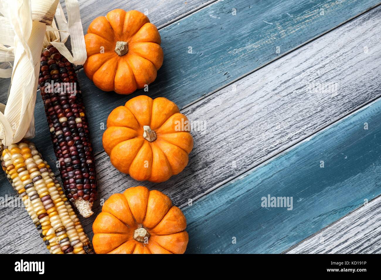 Pumpkin on wood background Stock Photo - Alamy