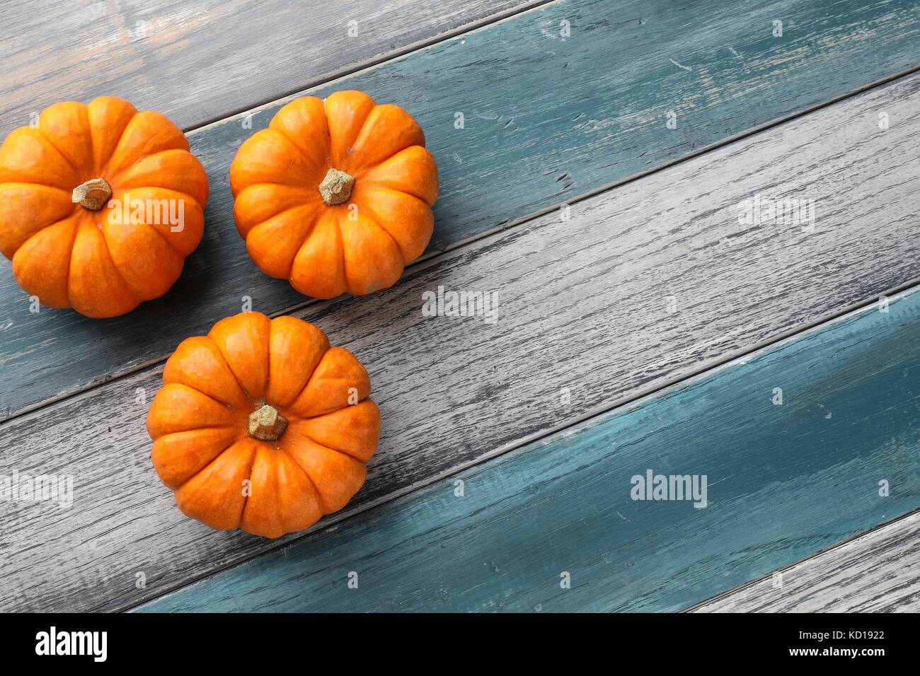 Pumpkin on wood background Stock Photo - Alamy