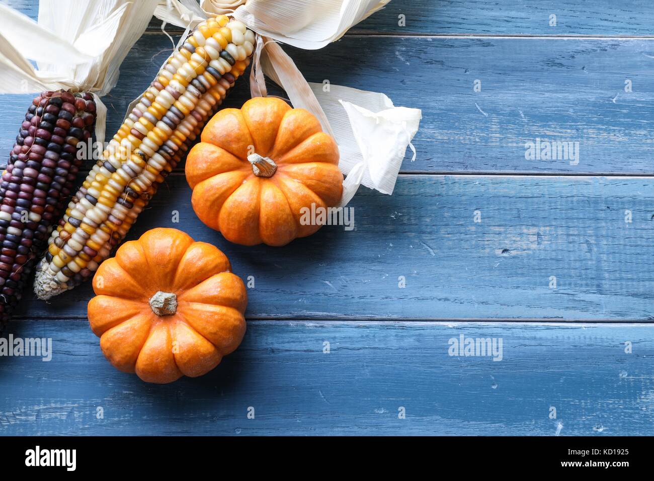 Pumpkin on wood background Stock Photo - Alamy