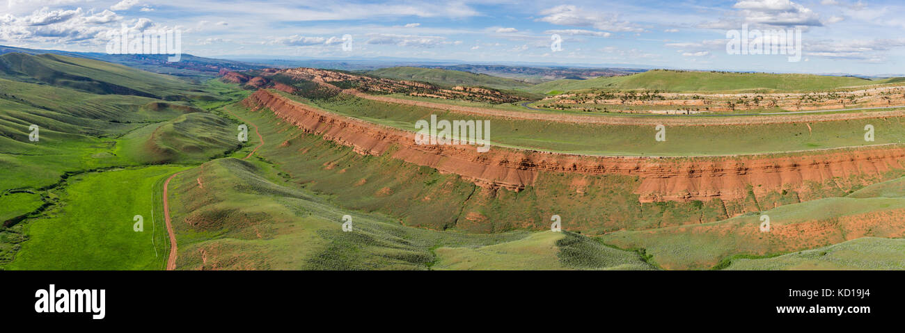 Red line of rocks leads into the distance of Red Canyon in central ...
