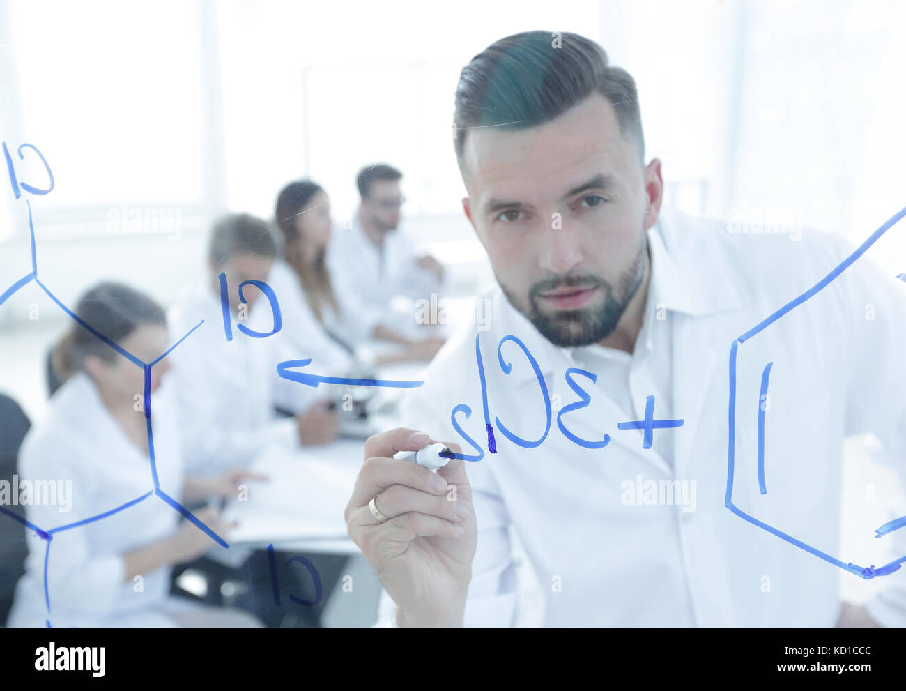closeup of a serious scientist working with formulas Stock Photo - Alamy