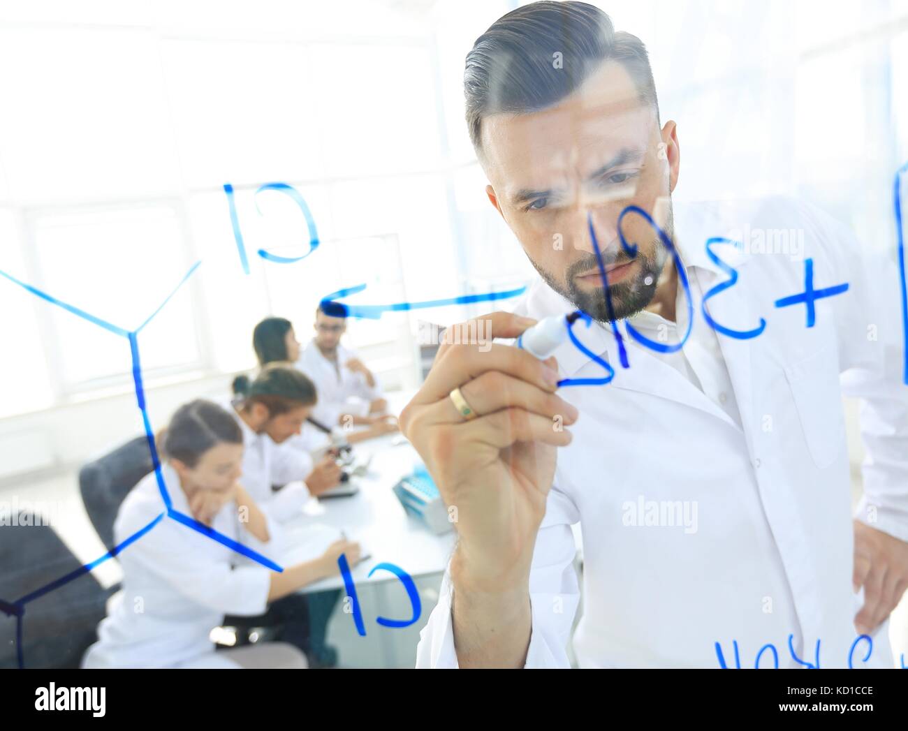 close up of a Man scientist working with formulas Stock Photo - Alamy