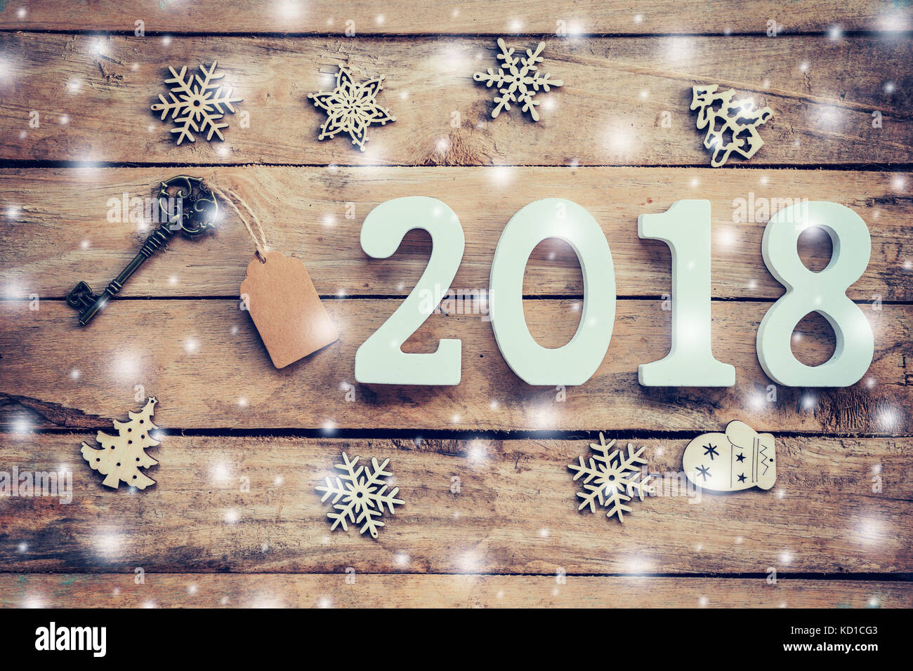 Old key with tag and wooden numbers forming the number 2018, For the ...