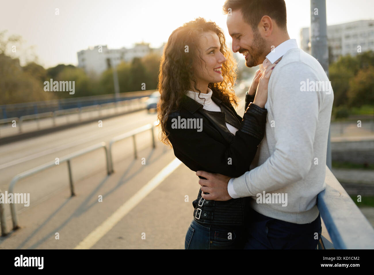 Couple cuddling while enjoying time spent together Stock Photo - Alamy