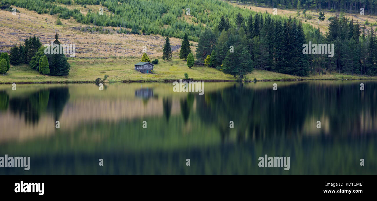 House on the bank of Backwater Reservoir, Angus, Scotland Stock Photo ...