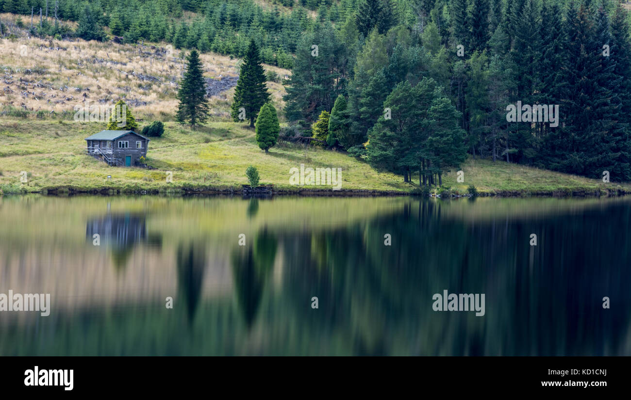 House on the bank of Backwater Reservoir, Angus, Scotland Stock Photo ...