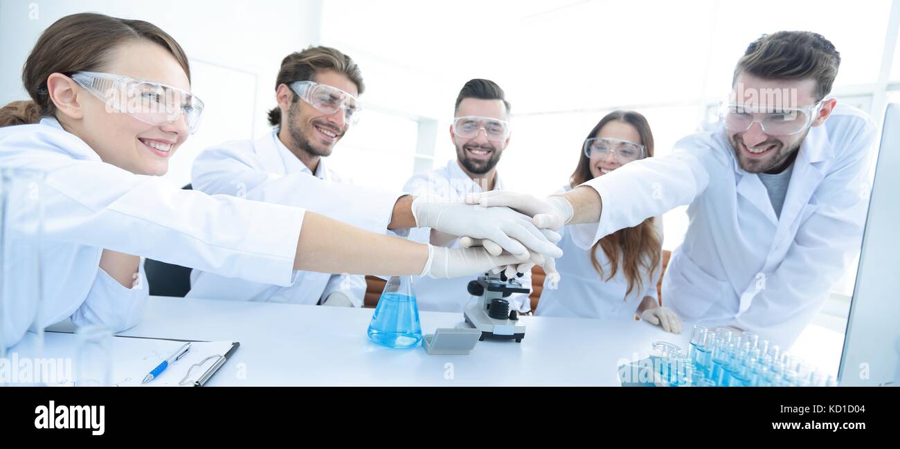 creative team of young scientists Stock Photo - Alamy