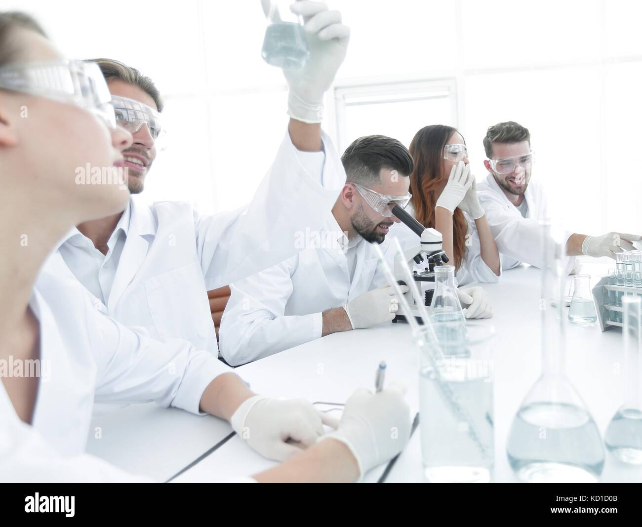 young microbiologists working in the laboratory Stock Photo - Alamy