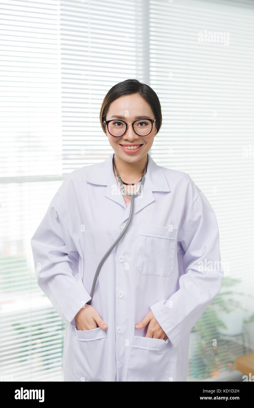 Portrait of cheerful happy female doctor in hospital Stock Photo - Alamy