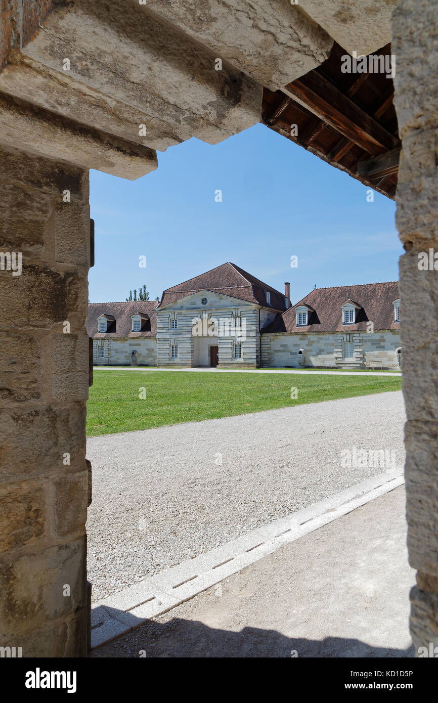 Through the arch in Saline Royale (Royal Saltworks) at Arc-et-Senans ...