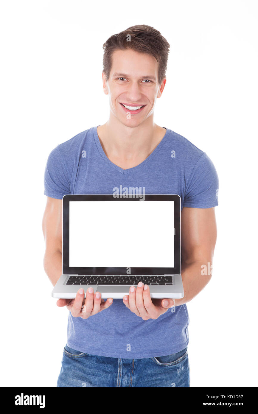 Young man laptop shopping hi-res stock photography and images - Alamy