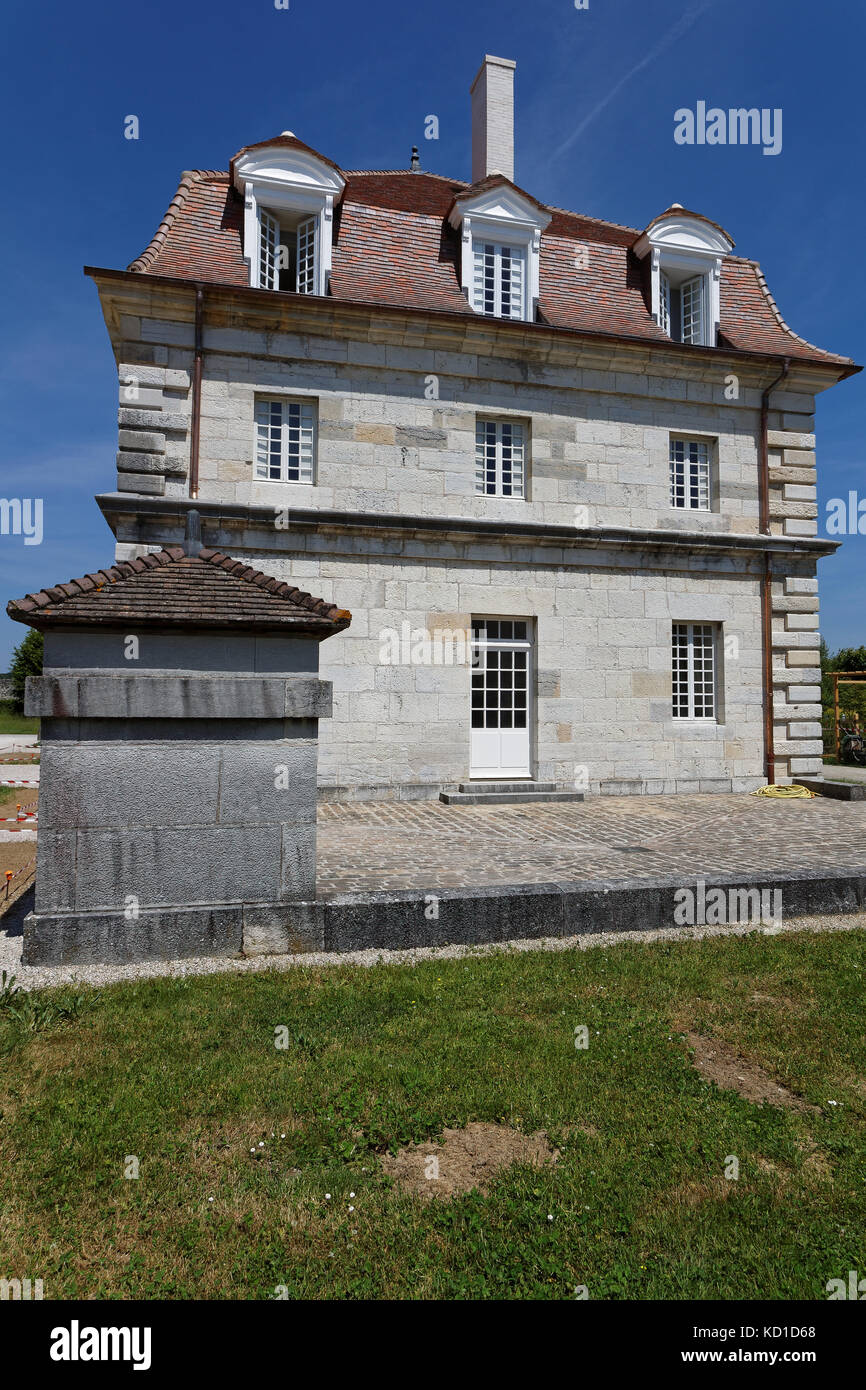 A building in Saline Royale (Royal Saltworks) at Arc-et-Senans, France ...