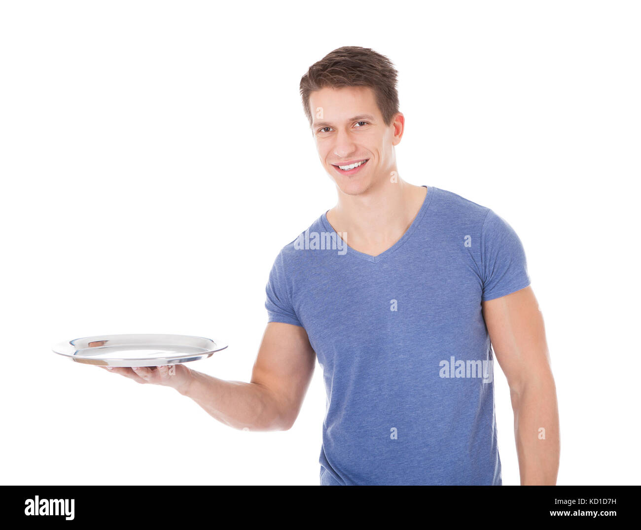 Happy Young Man Holding Empty Plate Over White Background Stock Photo ...