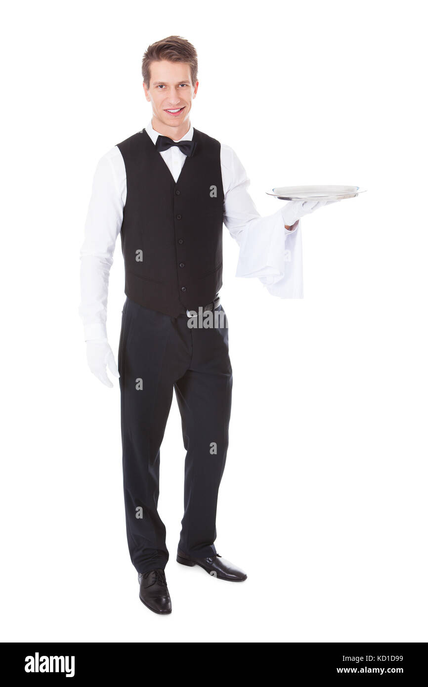 Young Male Waiter Standing With Cloche Lid Cover Over White Background ...