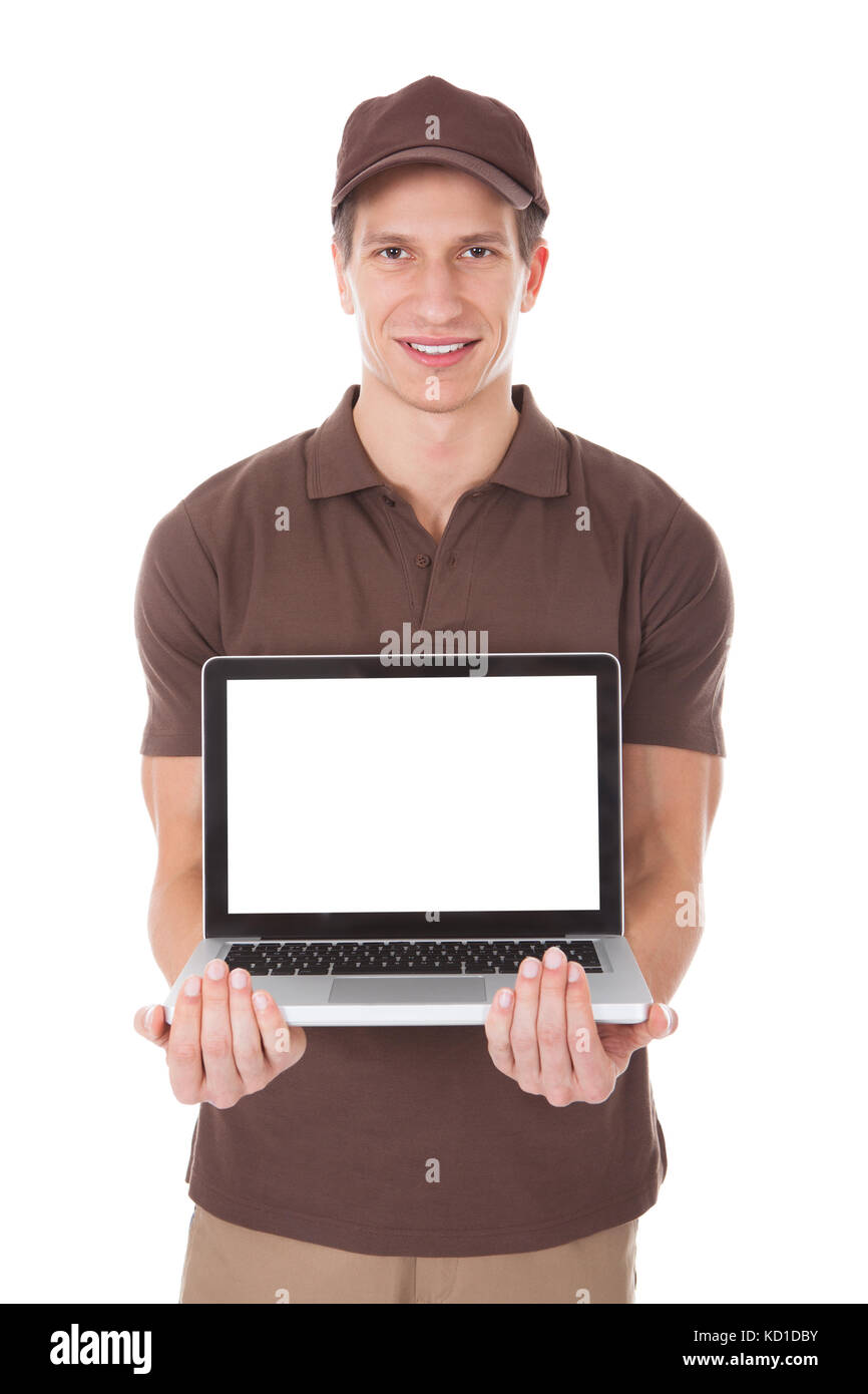 Young Delivery Man Holding Laptop Over White Background Stock Photo - Alamy
