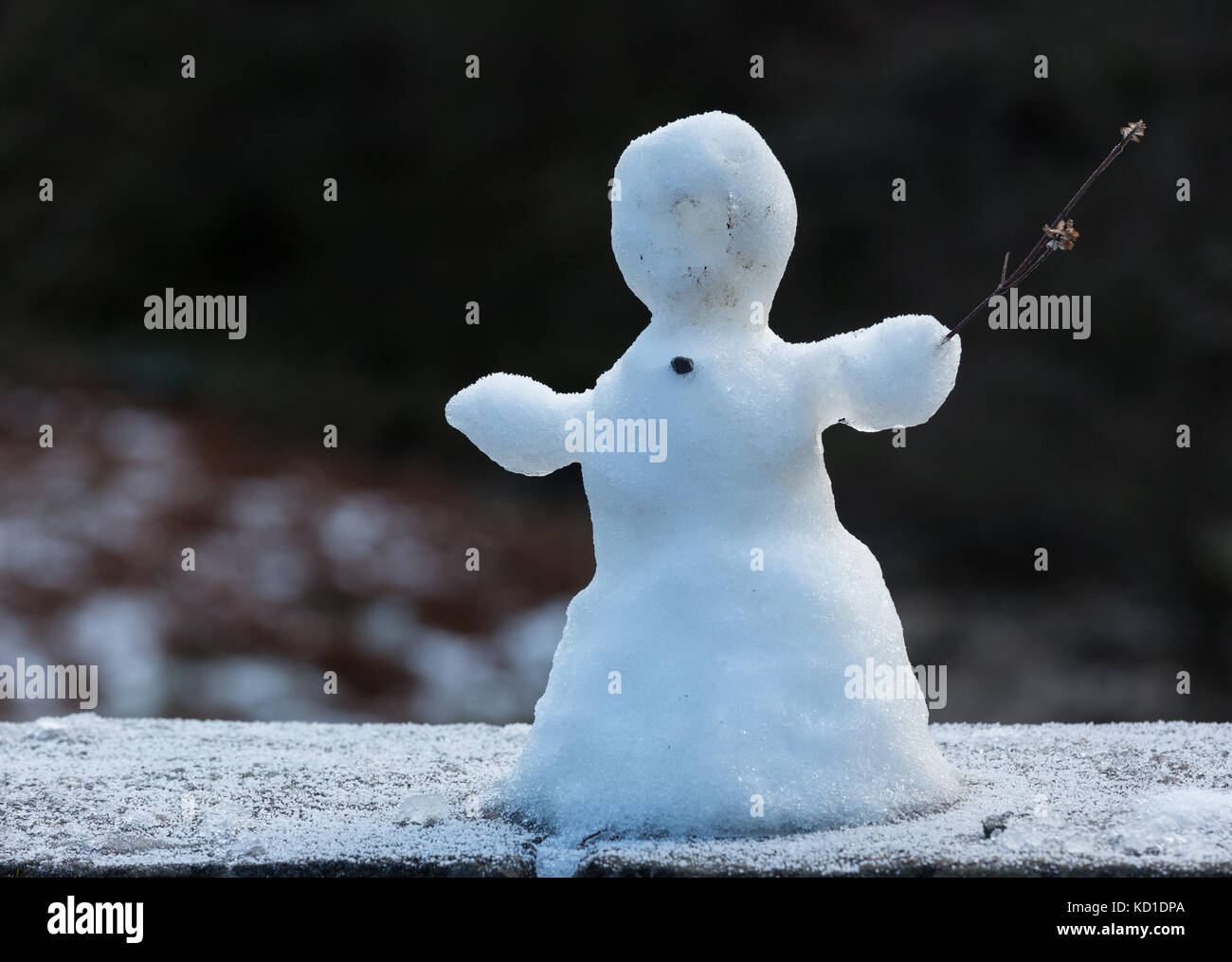 small snowman on wall Stock Photo - Alamy