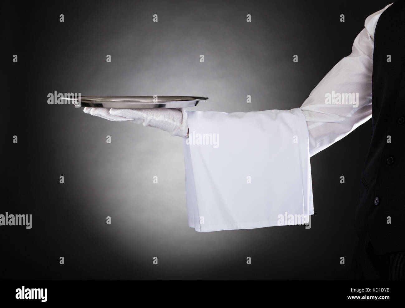 Waiters Hand Holding Tray Over Black Background Stock Photo - Alamy