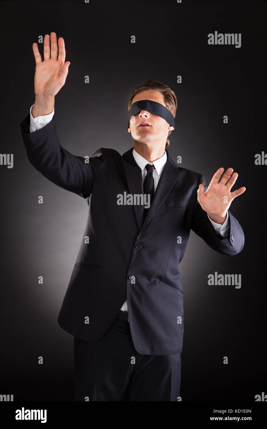 Portrait Of Young Disoriented Businessman Over White Background Stock ...