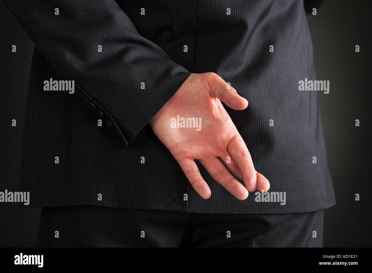 Man hands behind back rear view hi-res stock photography and images - Alamy