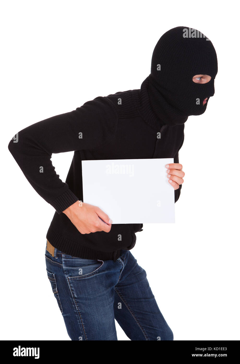 Burglar Man Holding Blank Placard And Looking Back Over White ...