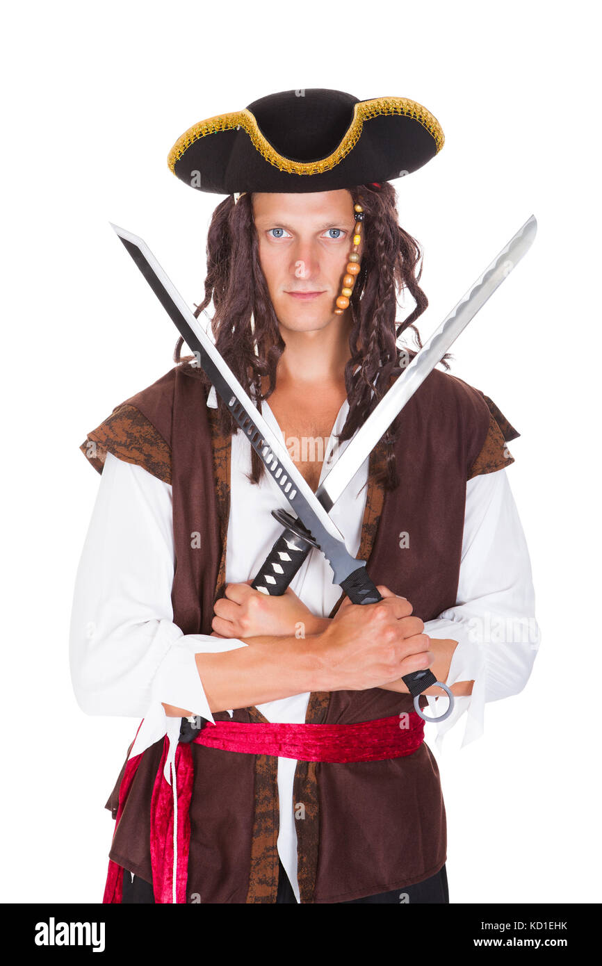 Portrait Of A Young Pirate Holding Sword On White Background Stock ...