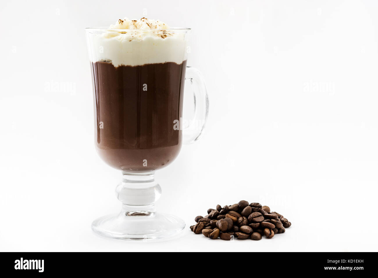 Irish coffee in glass isolated on white background Stock Photo - Alamy