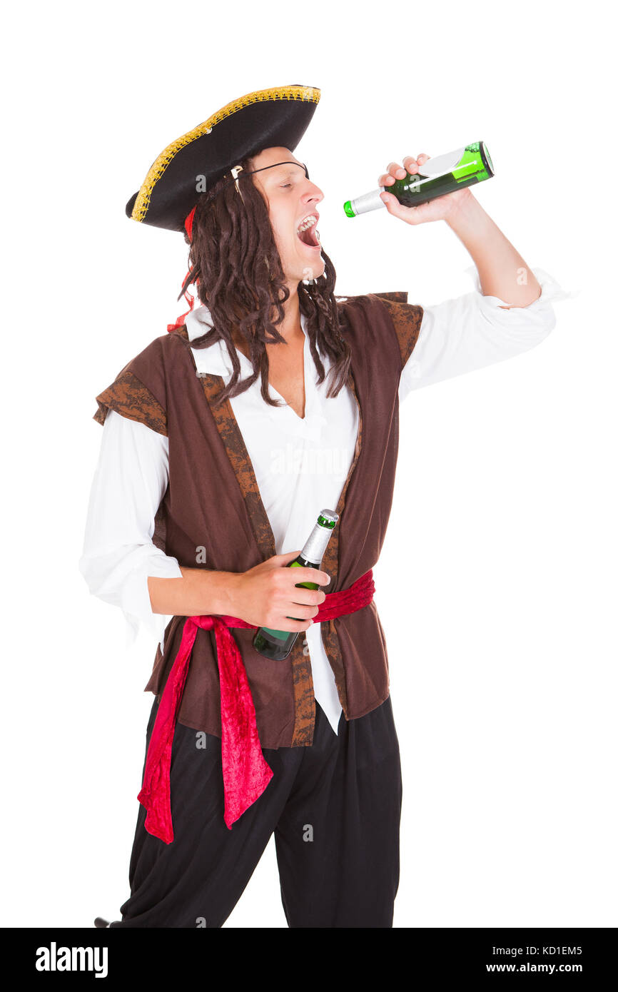 Pirate Standing On White Background Drinking Beer Stock Photo - Alamy