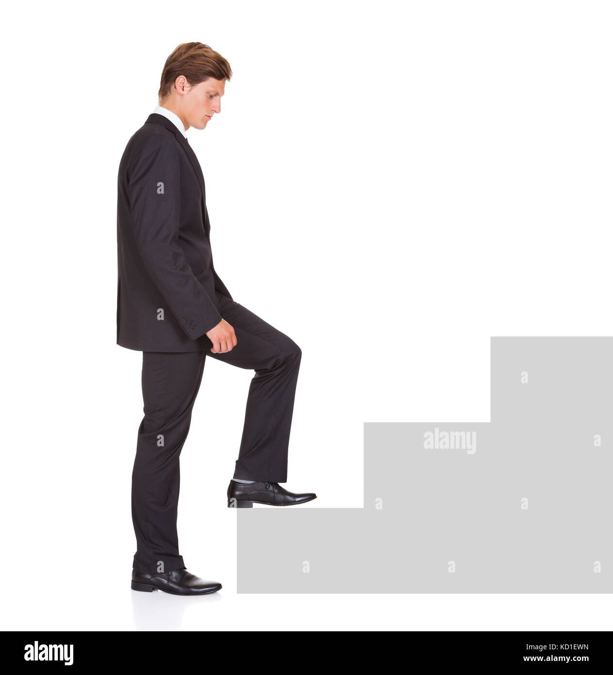 Young Businessman Started Climbing Step Of Success On White Background ...