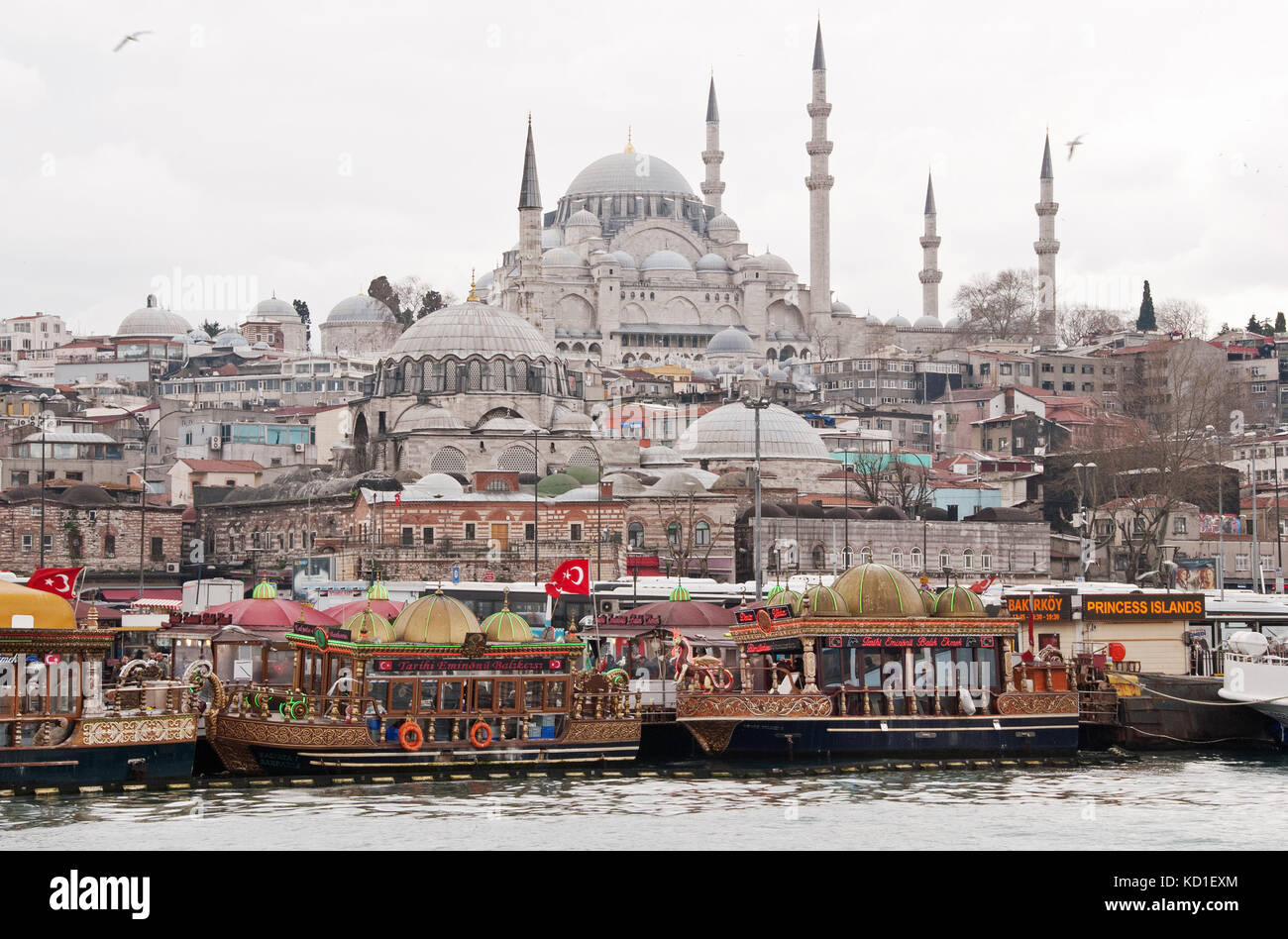 Ferry terminal at Istanbul, Turkey with the Sultan Ahmet mosque in the ...