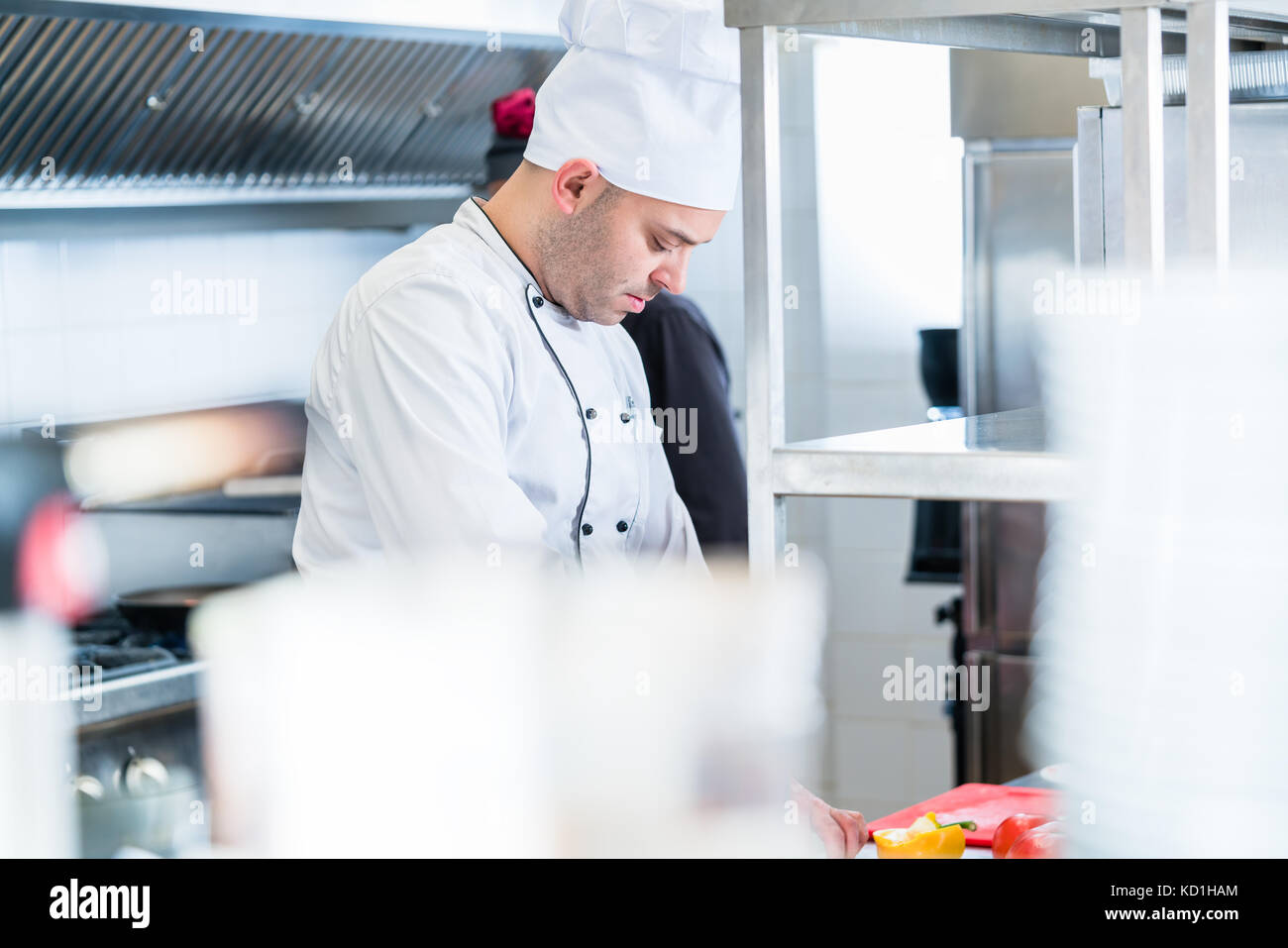 Chefs in their kitchen working Stock Photo - Alamy