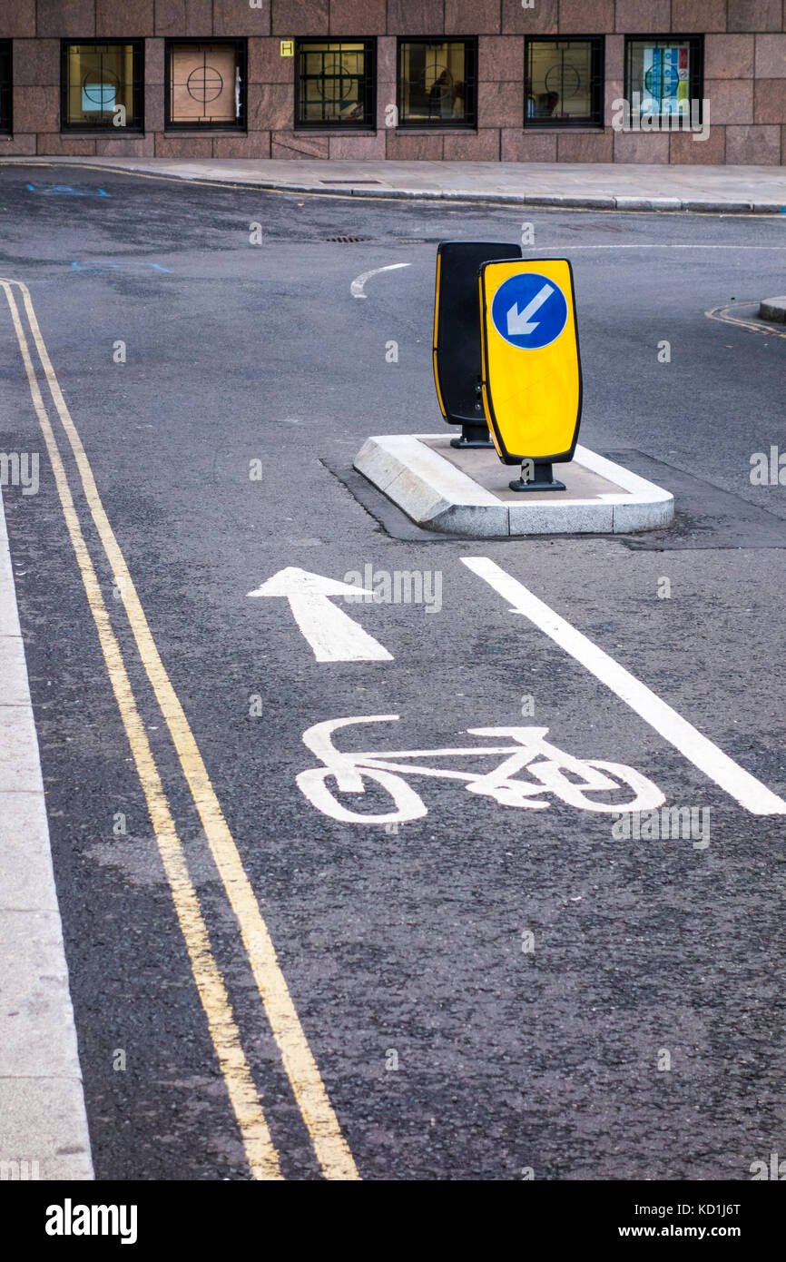Central road bollard next to separated dedicated cycle lane. Lambeth ...