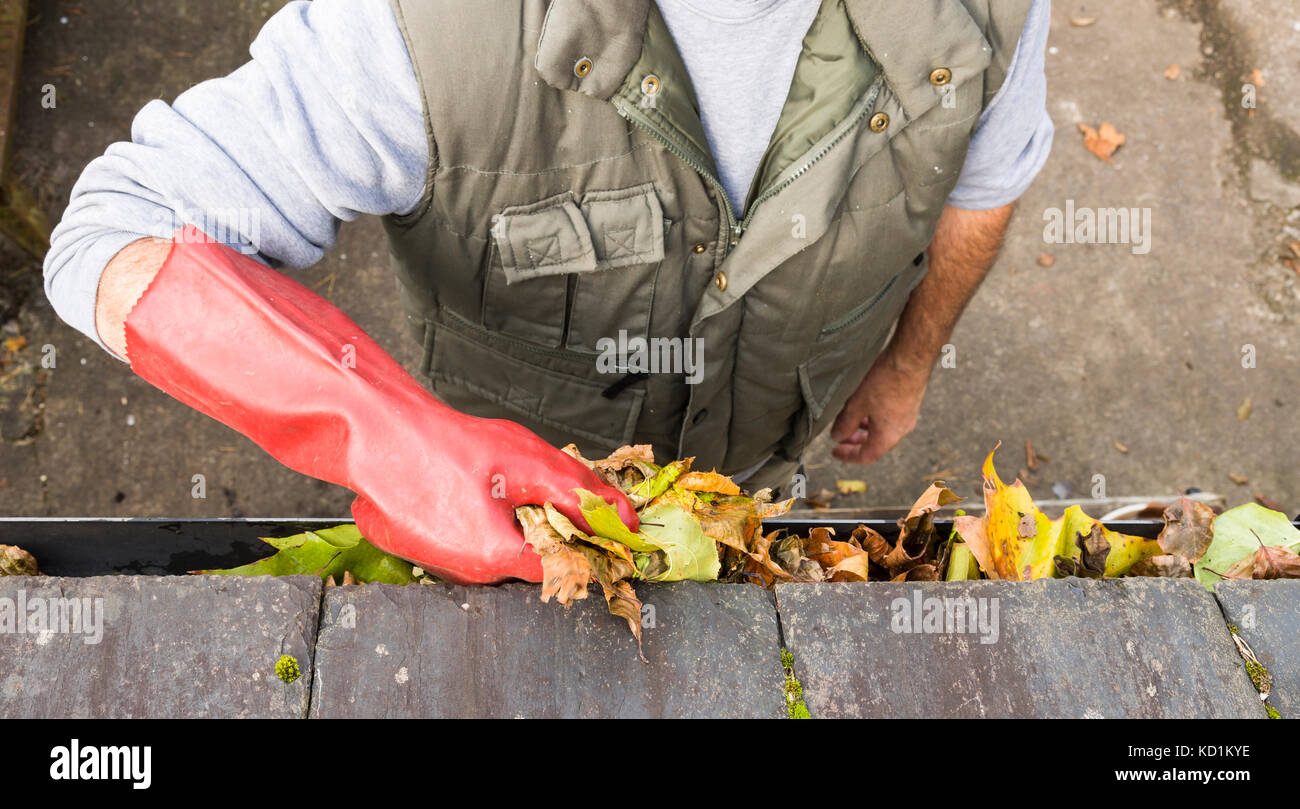 Gutter cleaning hi-res stock photography and images - Alamy