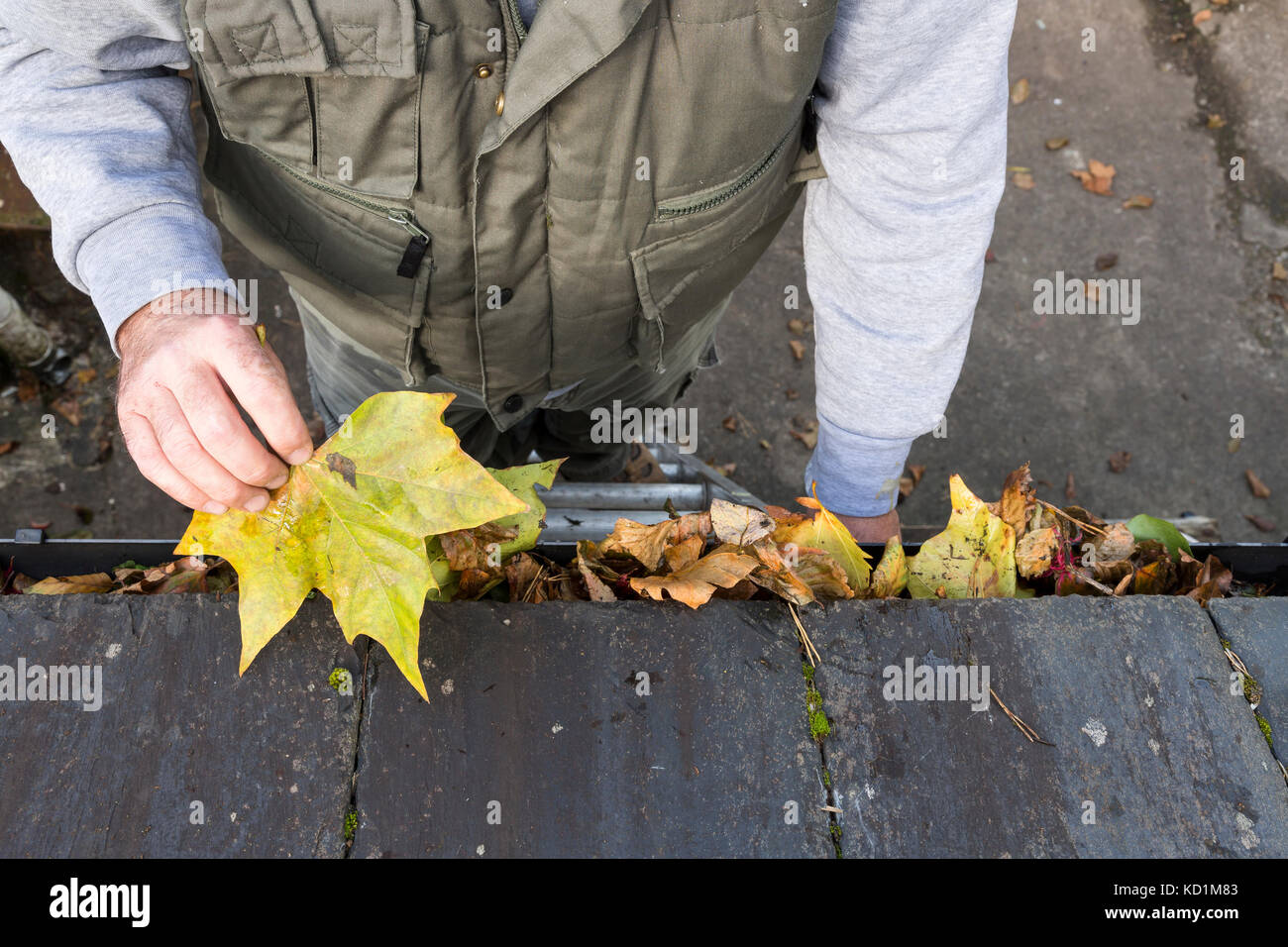 Gutter cleaning hi-res stock photography and images - Alamy