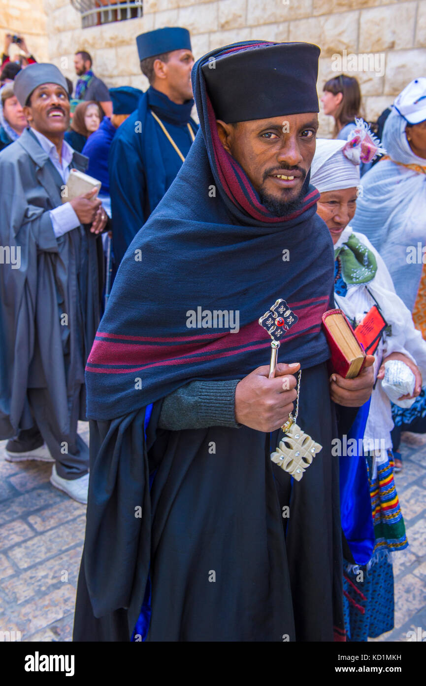 Christian pilgrim carry across along the Via Dolorosa in Jerusalem ...
