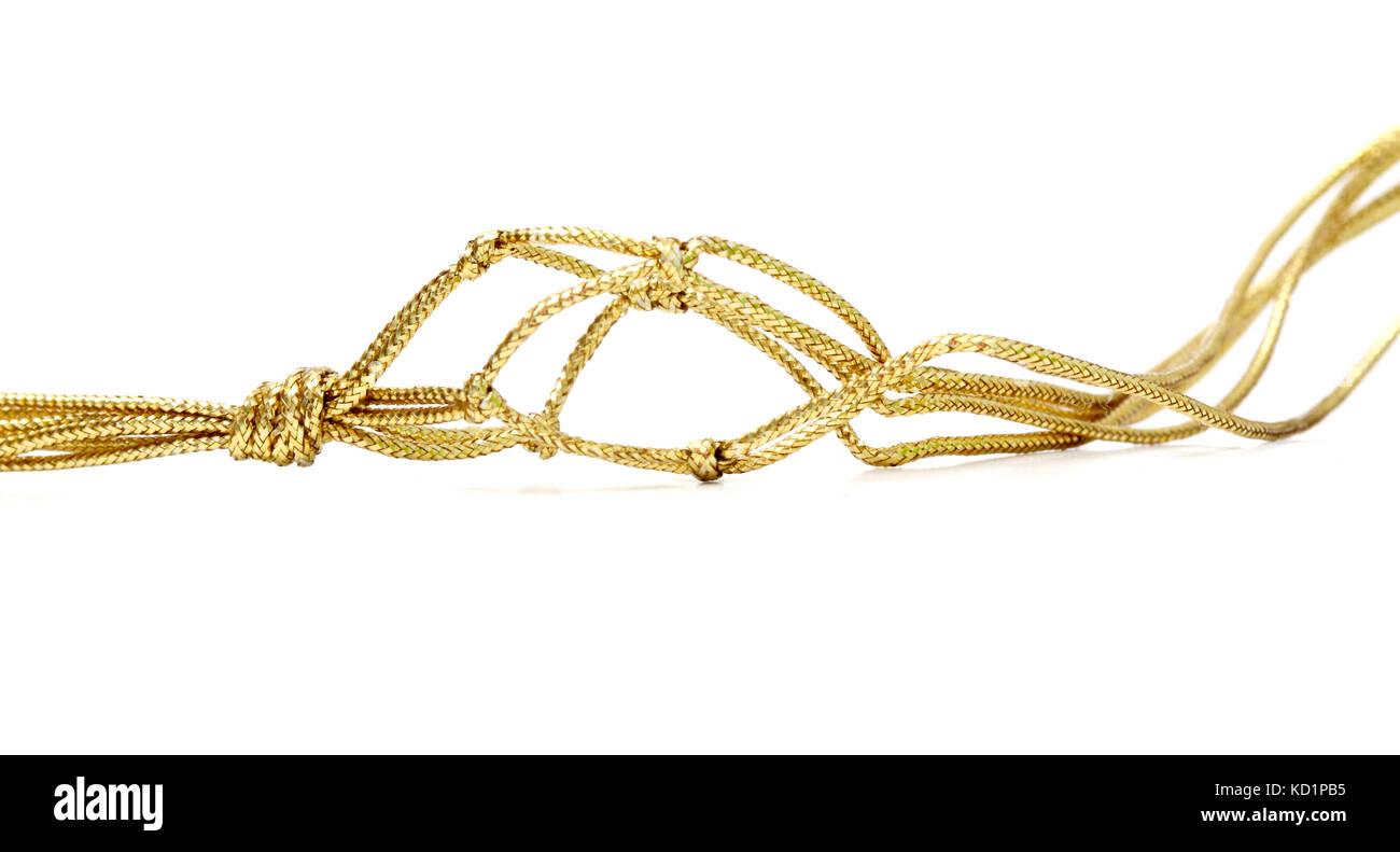 picture of a gold colored rope on white Stock Photo - Alamy