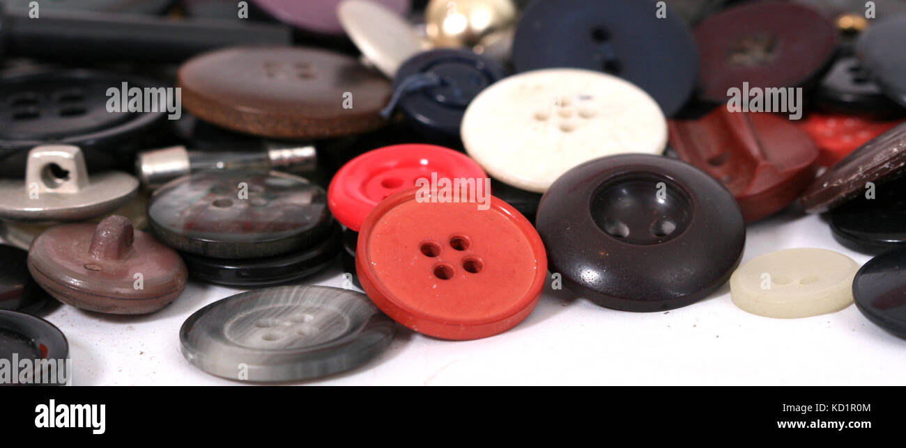 collection of various sewing button on white background Stock Photo - Alamy