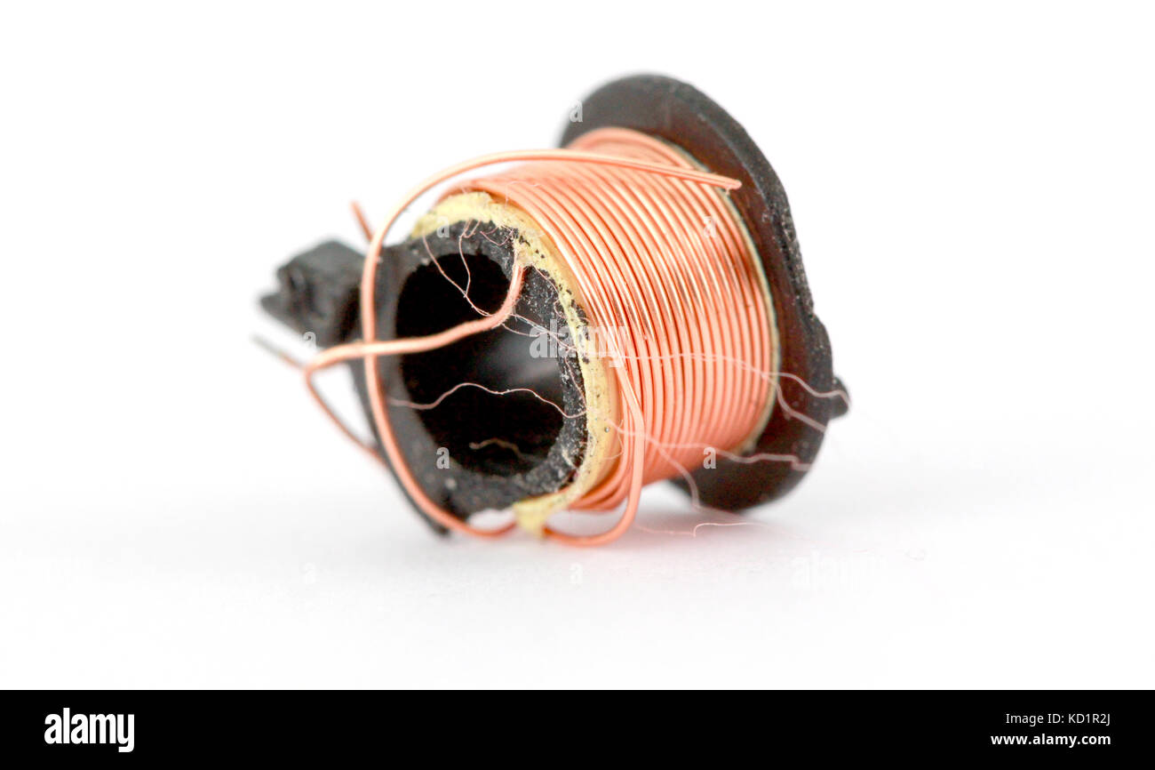 damaged small electric transformer on white, macro shot Stock Photo - Alamy