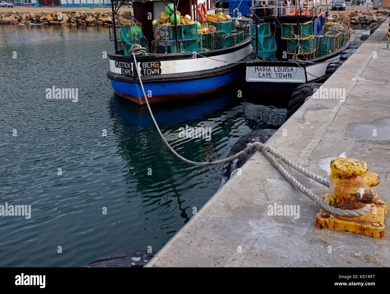 Fishing trawlers with crayfish pods in Hout Bay harbour, Cape Town ...