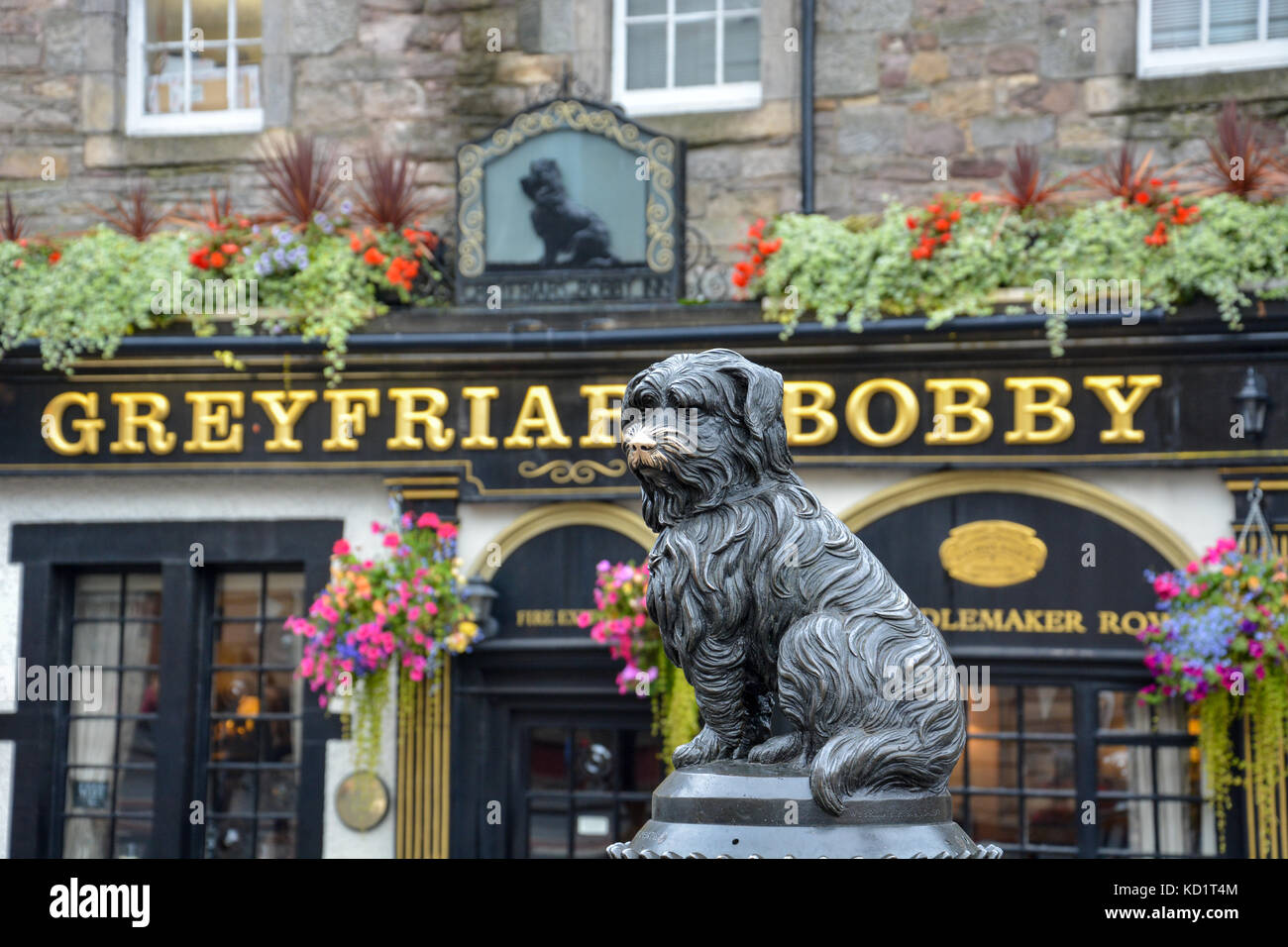 The statue of the dog Greyfriars Bobby in front of the pub in Edinburgh ...