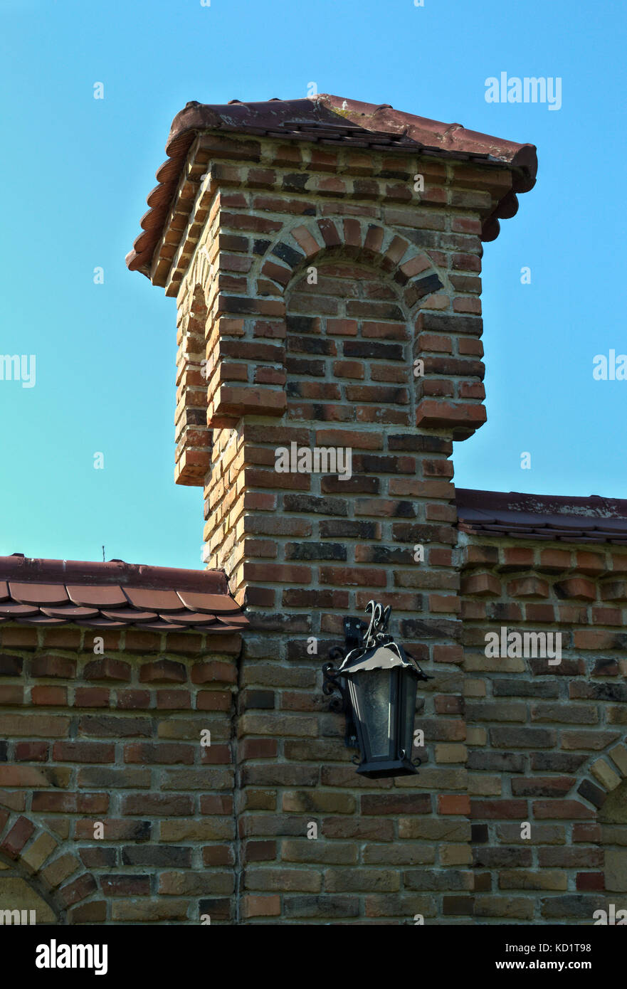 Small bricks tower on monastery fence, closeup Stock Photo - Alamy